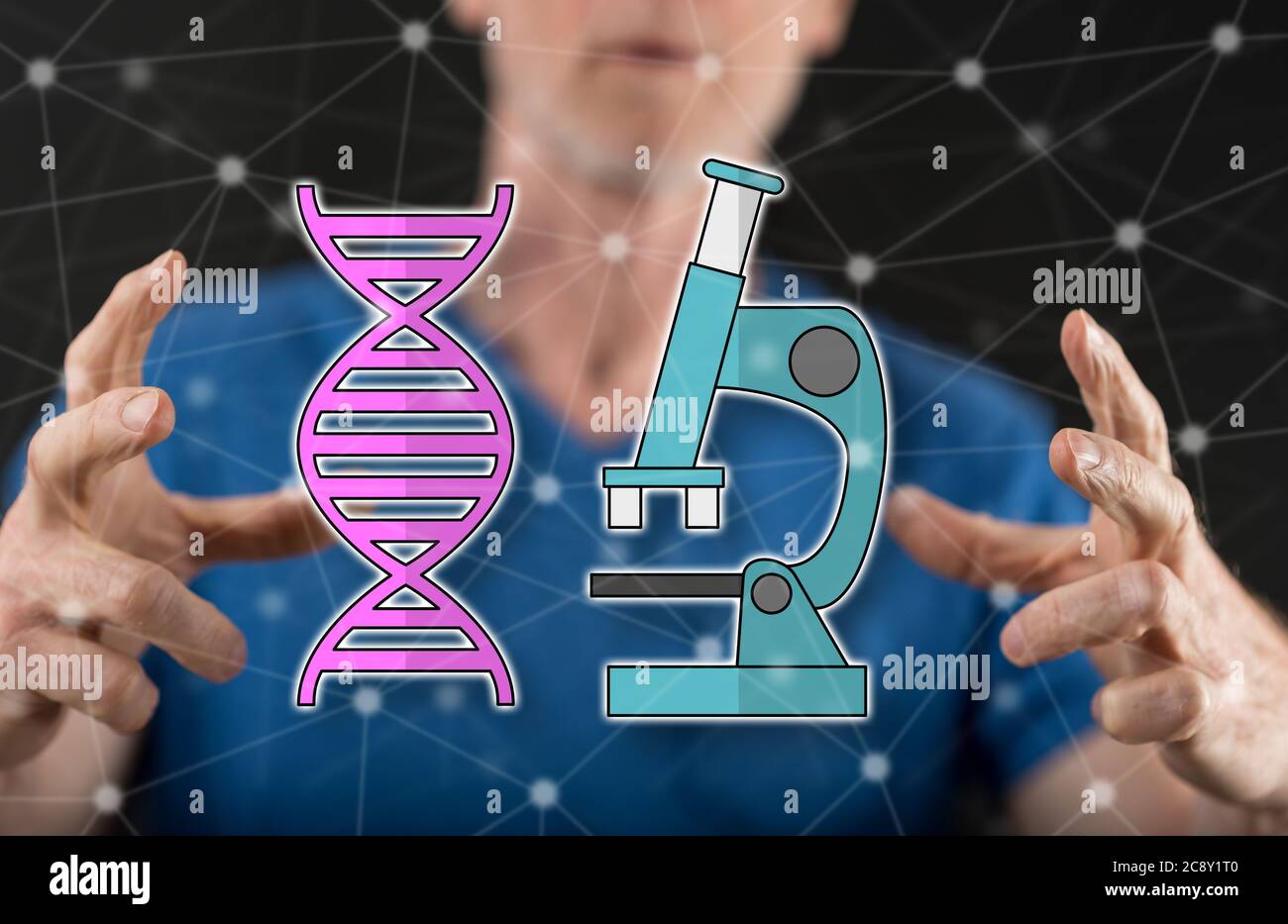 Dna technology concept between hands of a man in background Stock Photo ...