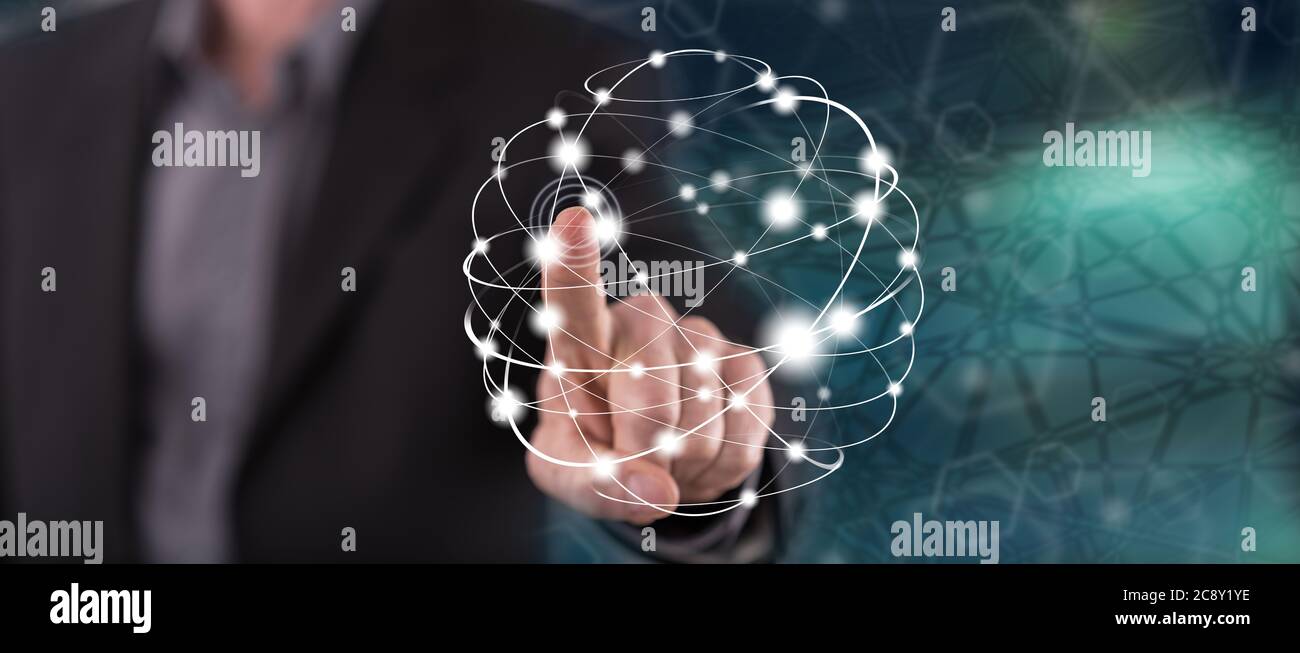 Man touching a global connection concept on a touch screen with his ...