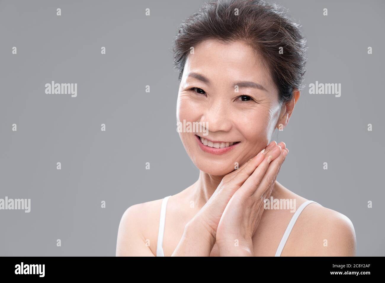 Elegant middle-aged woman happy Stock Photo - Alamy