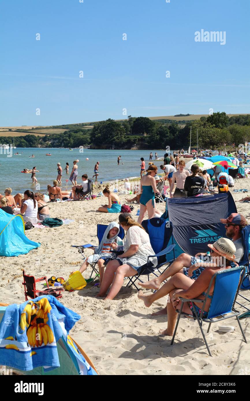 A crowded Knoll beach at Studland Bay on a hot sunny summers day ...