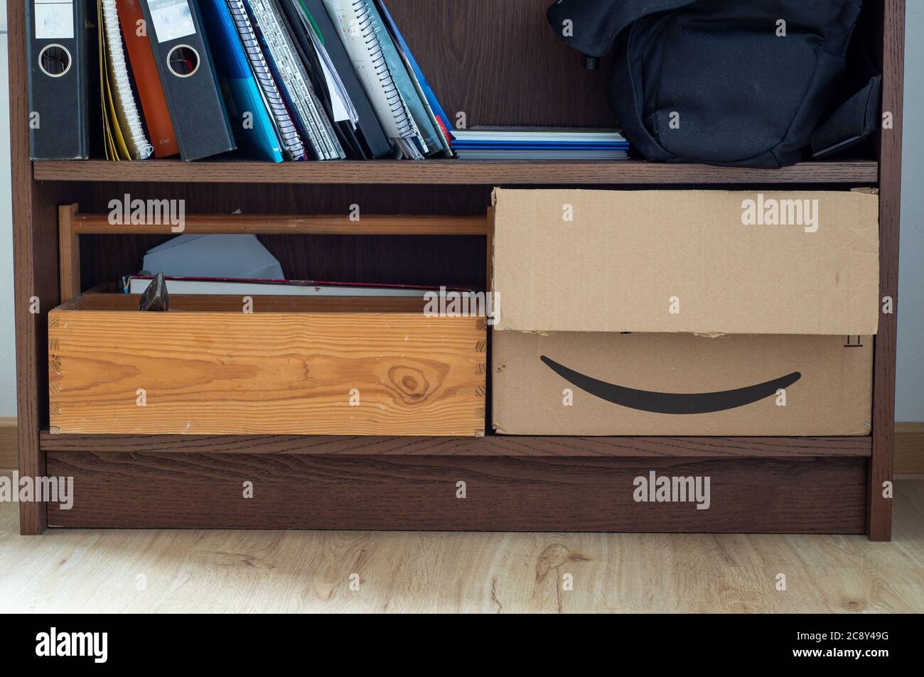 reuse of old packages cardboard as a box in a shelf. Upcycling Stock ...