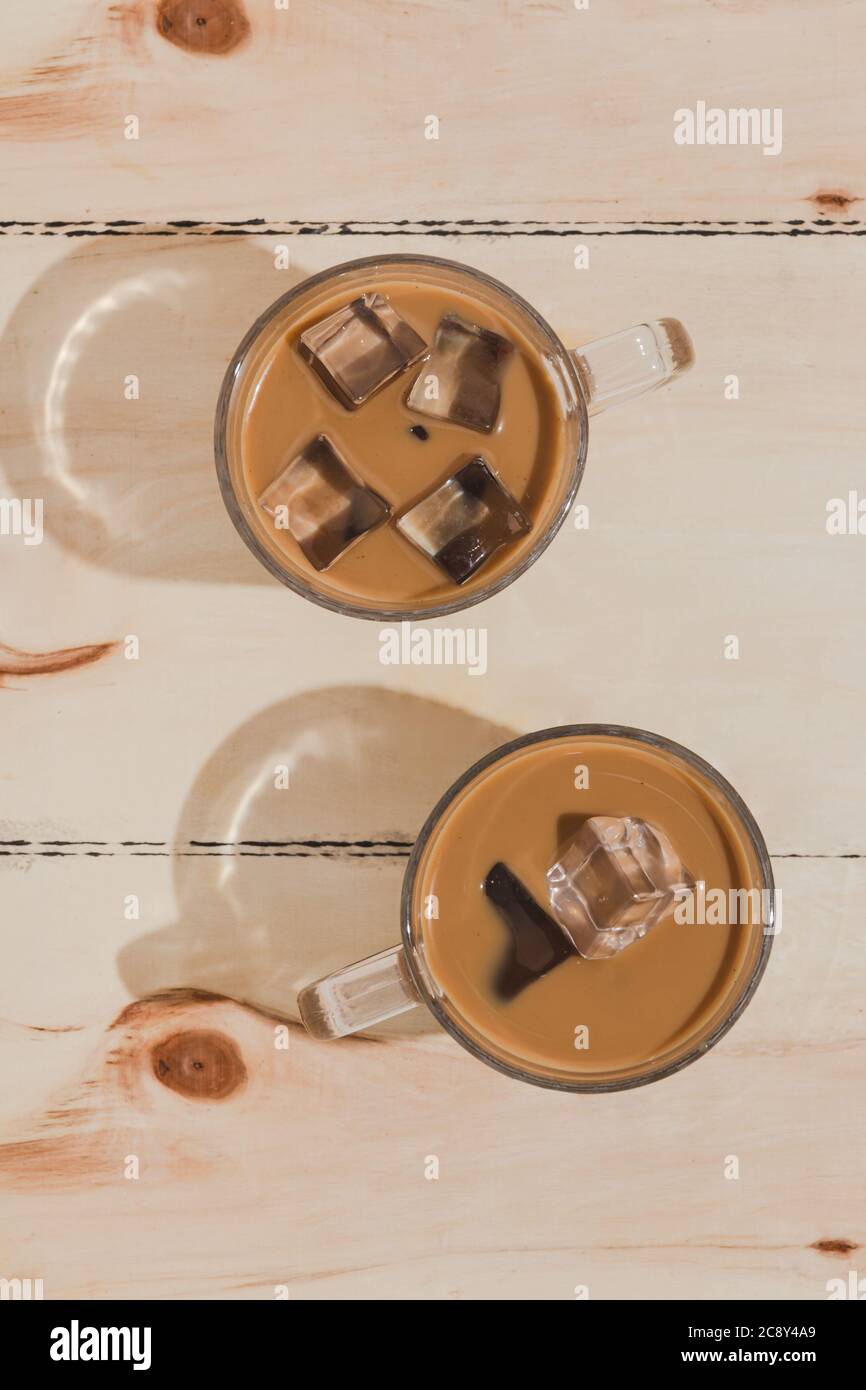 Ice coffee with morning light Stock Photo - Alamy