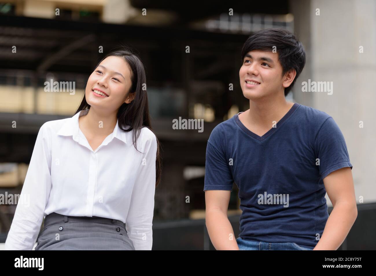 Asian people sitting together hi-res stock photography and images - Alamy