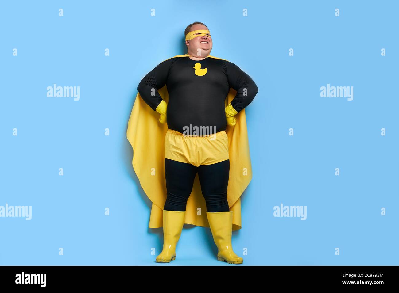 fat superhero caucasian man is able to save the world, he is wearing ...