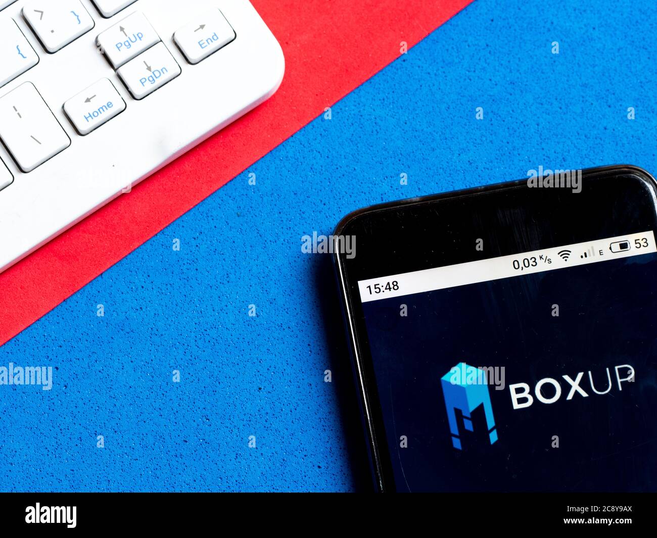 In this photo illustration a BoxUp logo is seen displayed on a ...