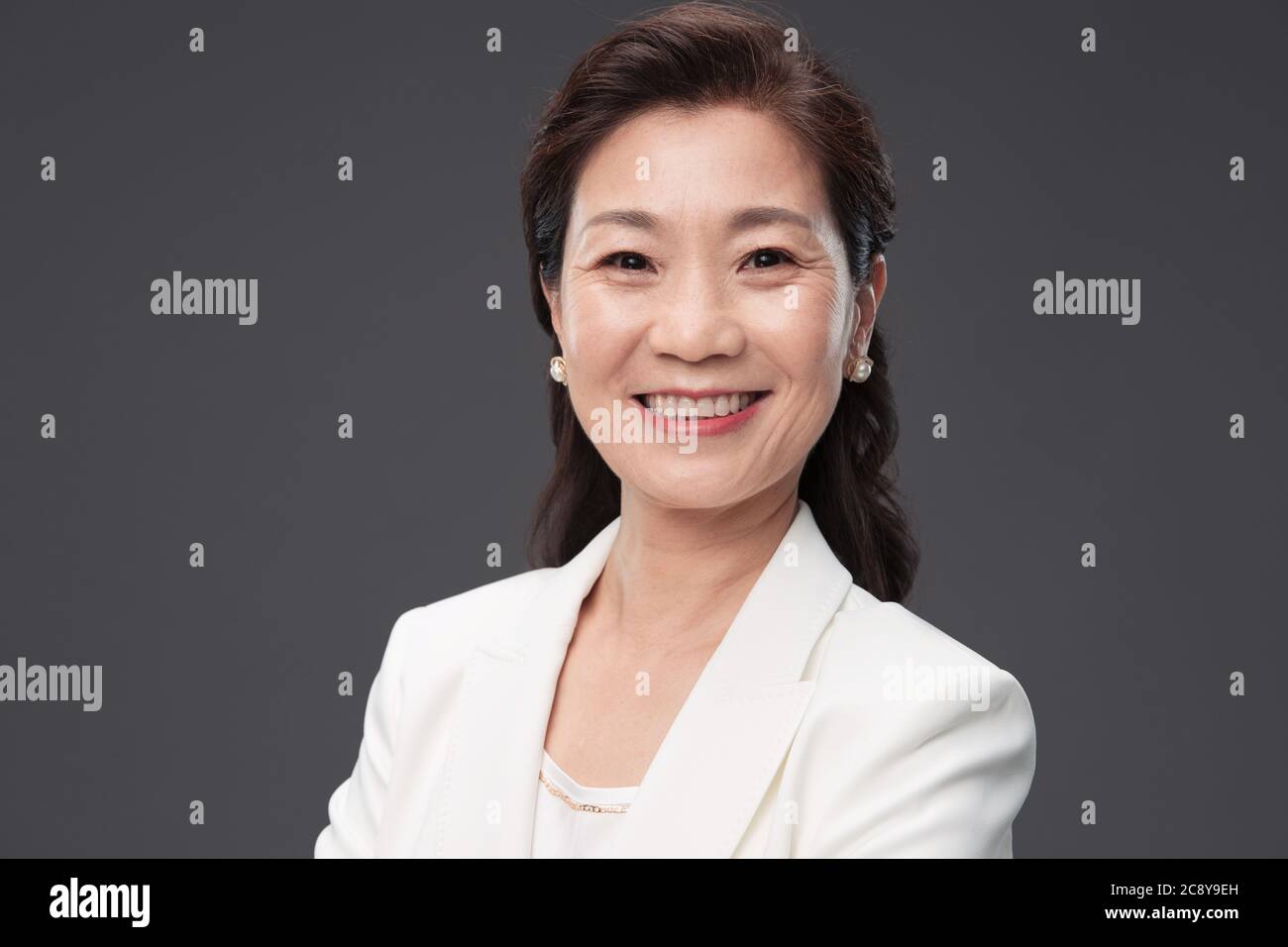 Ms grace happy middle-aged and old business Stock Photo - Alamy