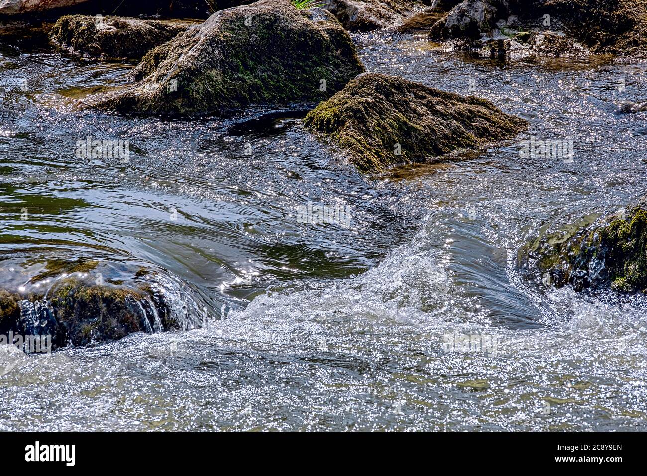 stones in the river washed by water Stock Photo - Alamy