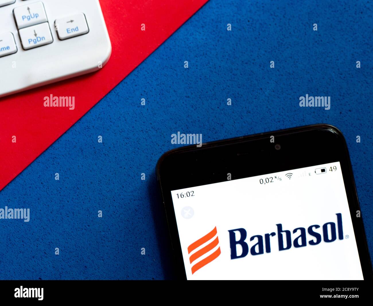 In this photo illustration a Barbasol logo is seen displayed on a ...