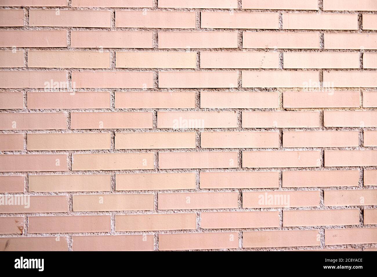 a brick wall texture with very striking colors Stock Photo - Alamy
