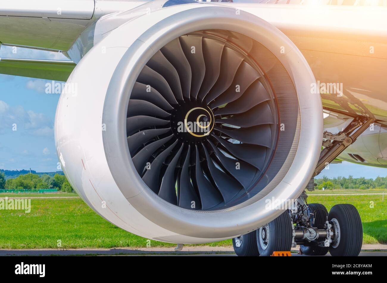 Jet engine and wing chassis parked at the airport Stock Photo - Alamy