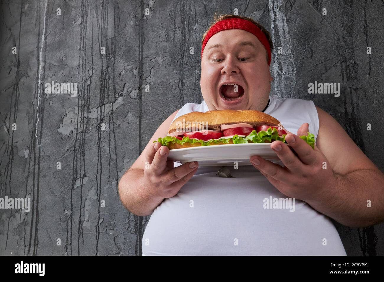 handsome caucasian fat man going to eat big tasty sandwich, he is not ...