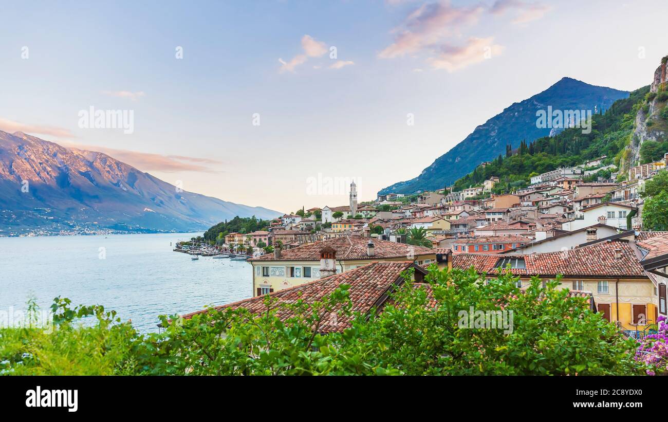 Limone sul Garda village at the lake, during a summer sunset. Popular ...