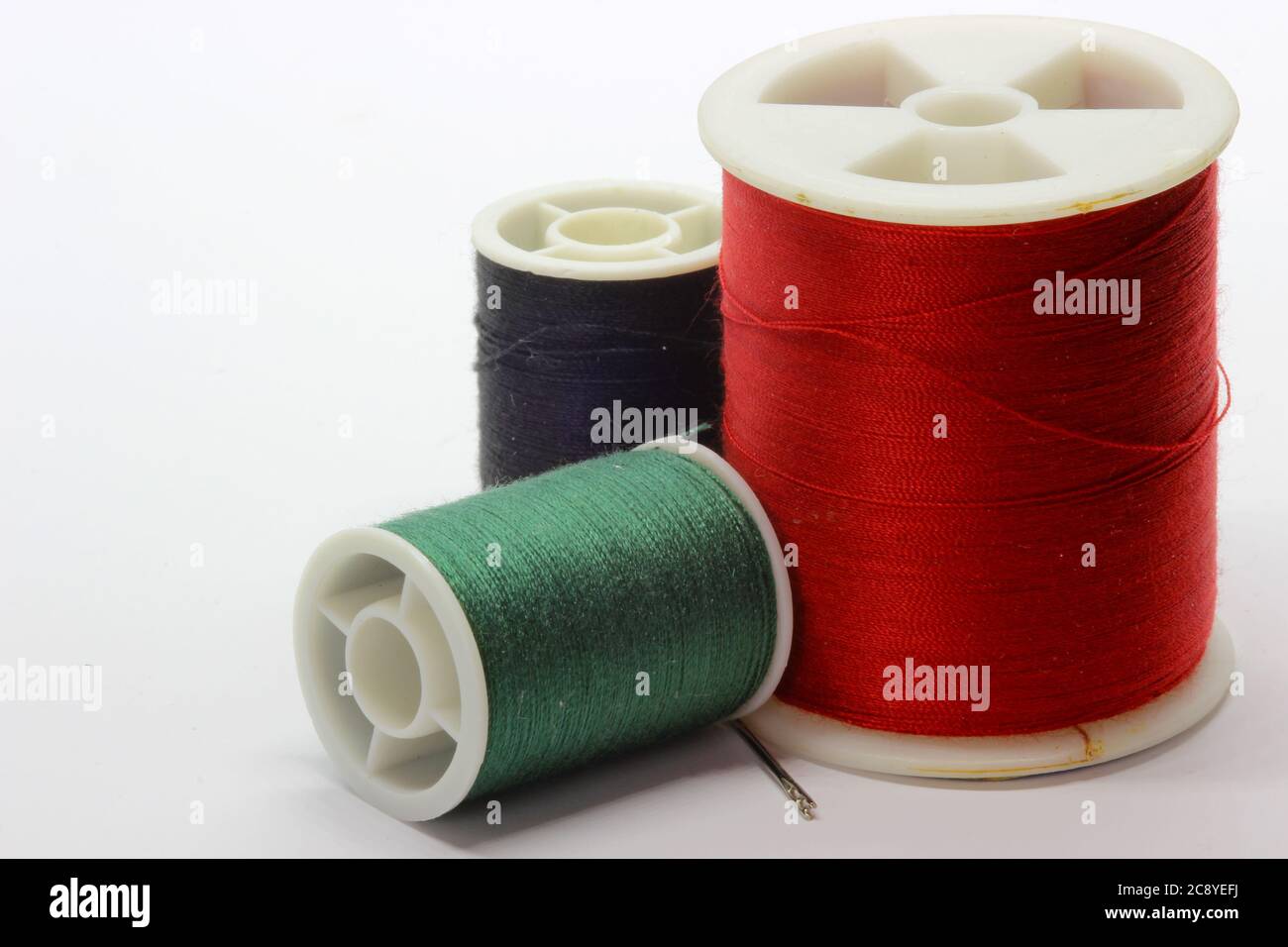 Spools of different coloured cotton Stock Photo - Alamy