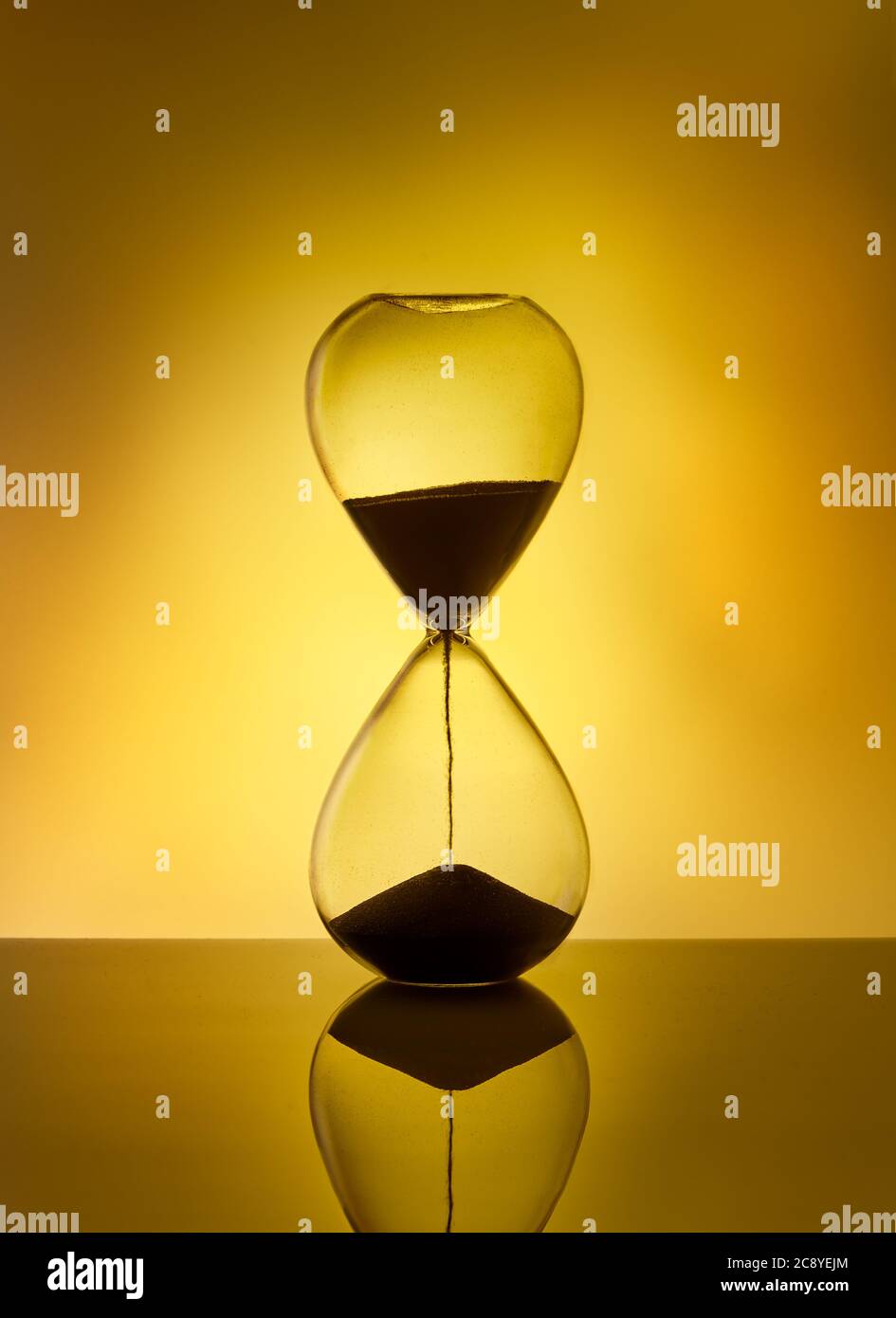 Hourglass as time passing concept for deadline, running out of time ...