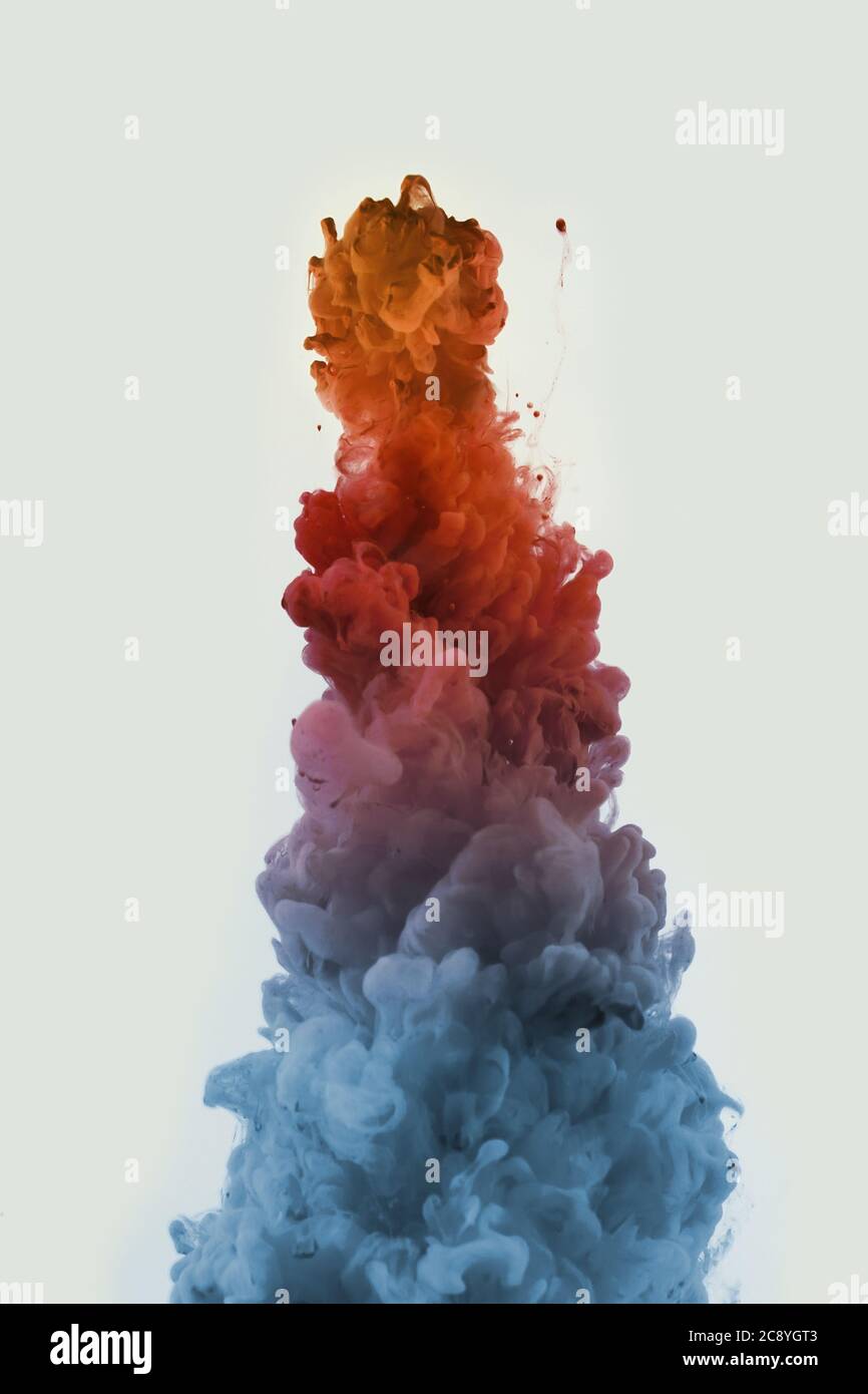 Closeup shot of colorful ink explosion on a white background Stock ...