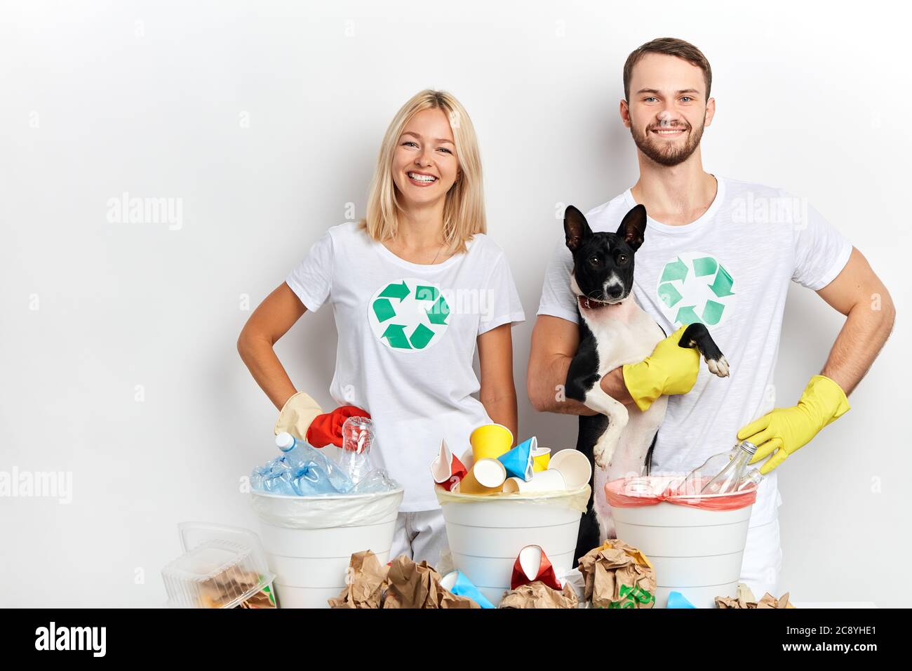 young active ambitious volunteers taking care of animals and nature ...
