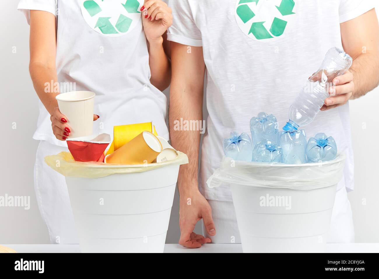 young woman and woman preparing litter to recycle and reuse. close up ...