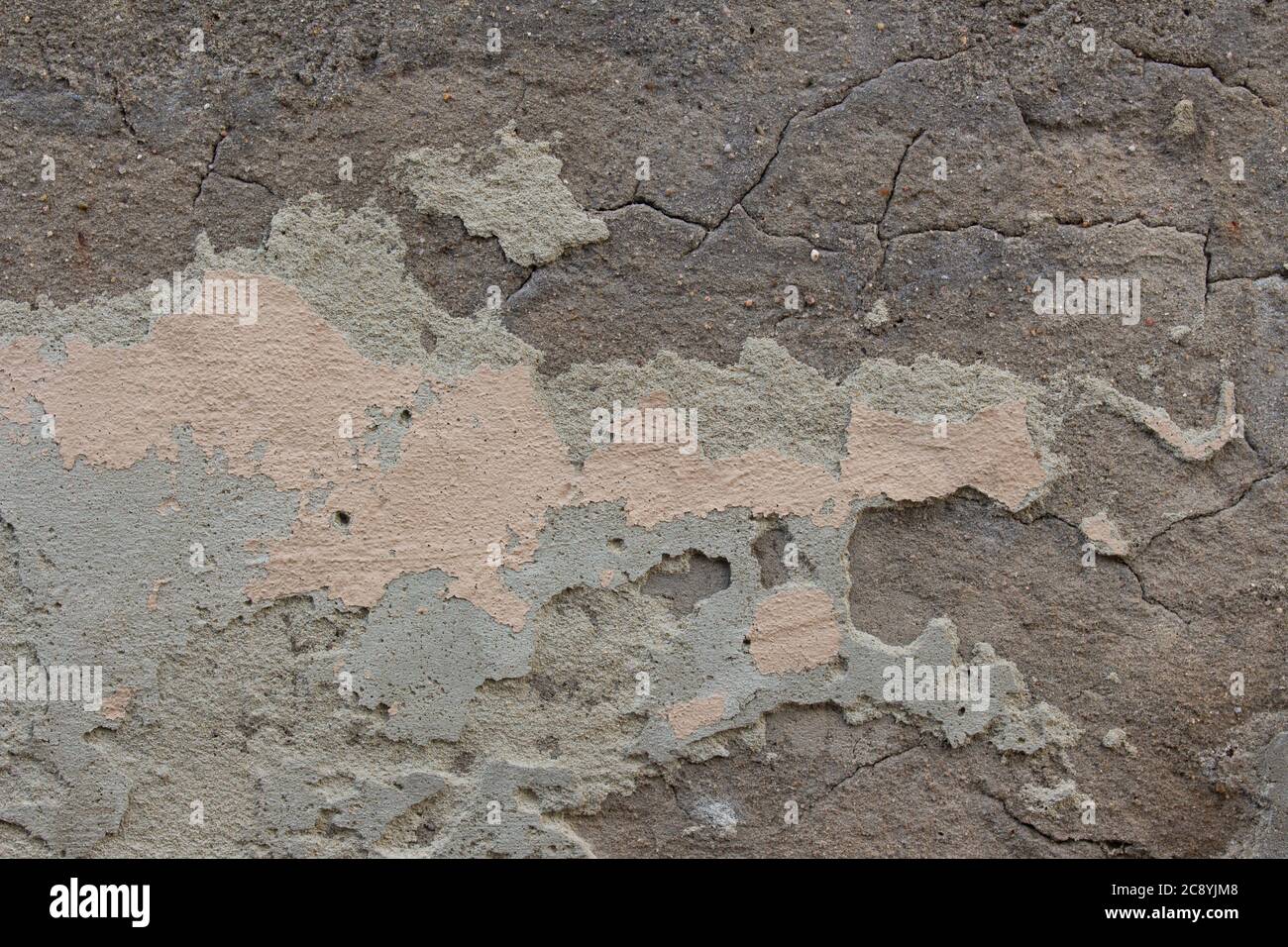 Old dirty weathered wall with layers of plaster falling off ready for ...