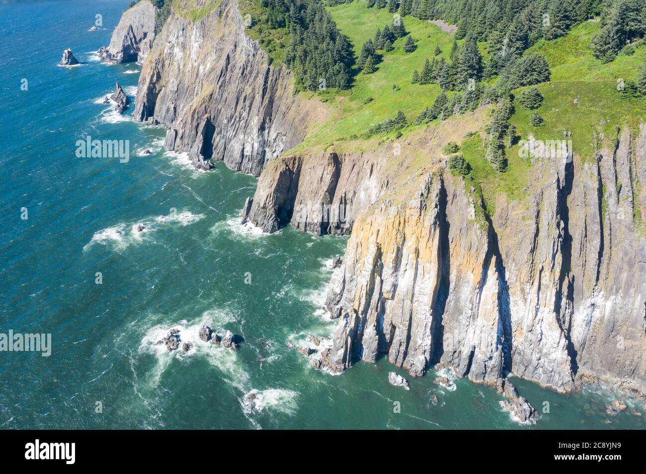 The cold water of the Pacific Ocean meets the rugged yet beautiful ...