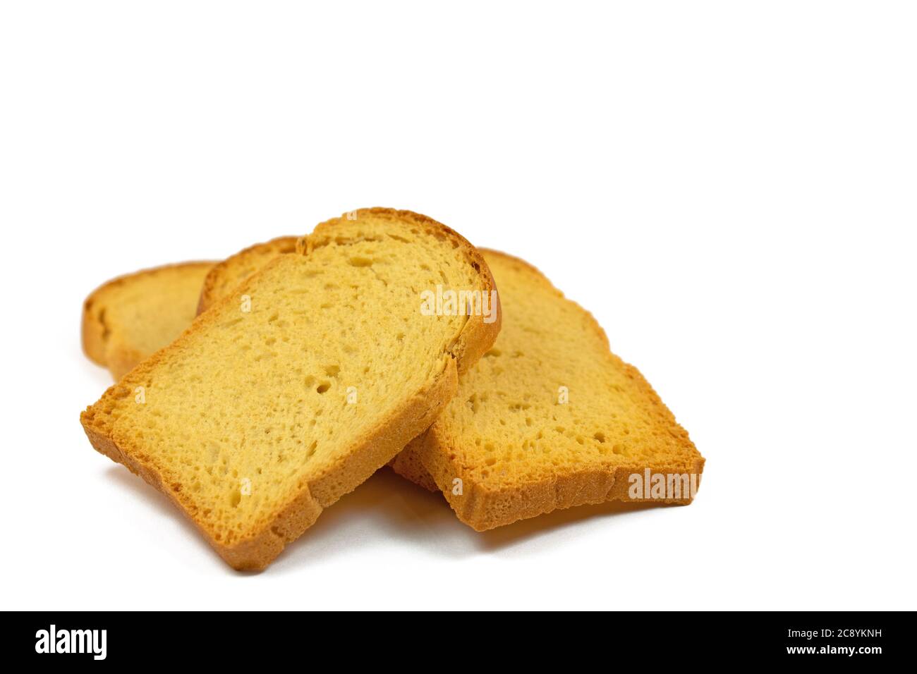 Sliced rusk against white background Stock Photo - Alamy