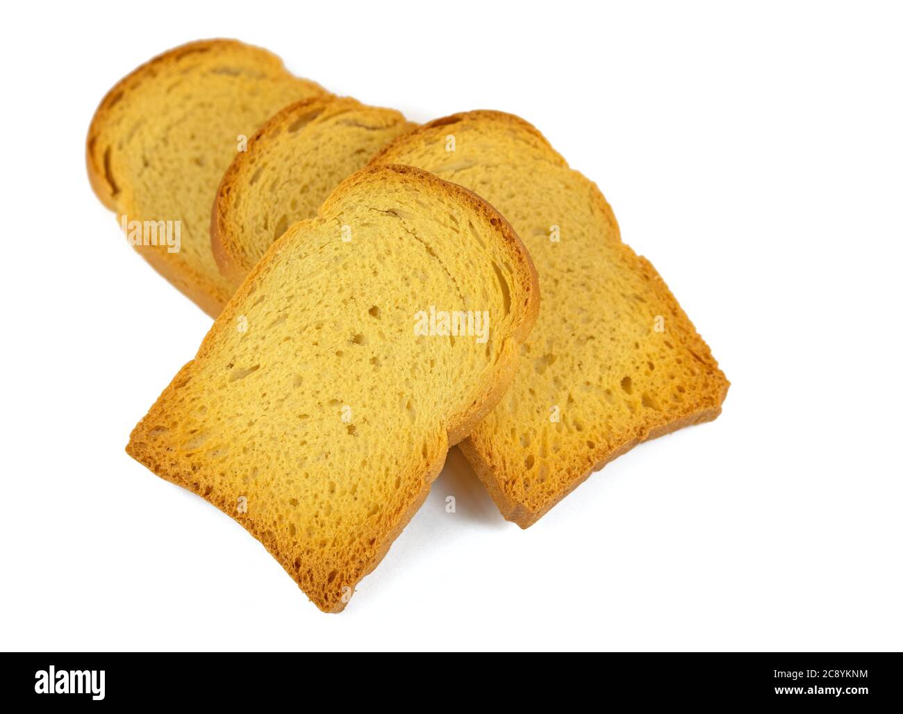 Sliced rusk against white background Stock Photo - Alamy