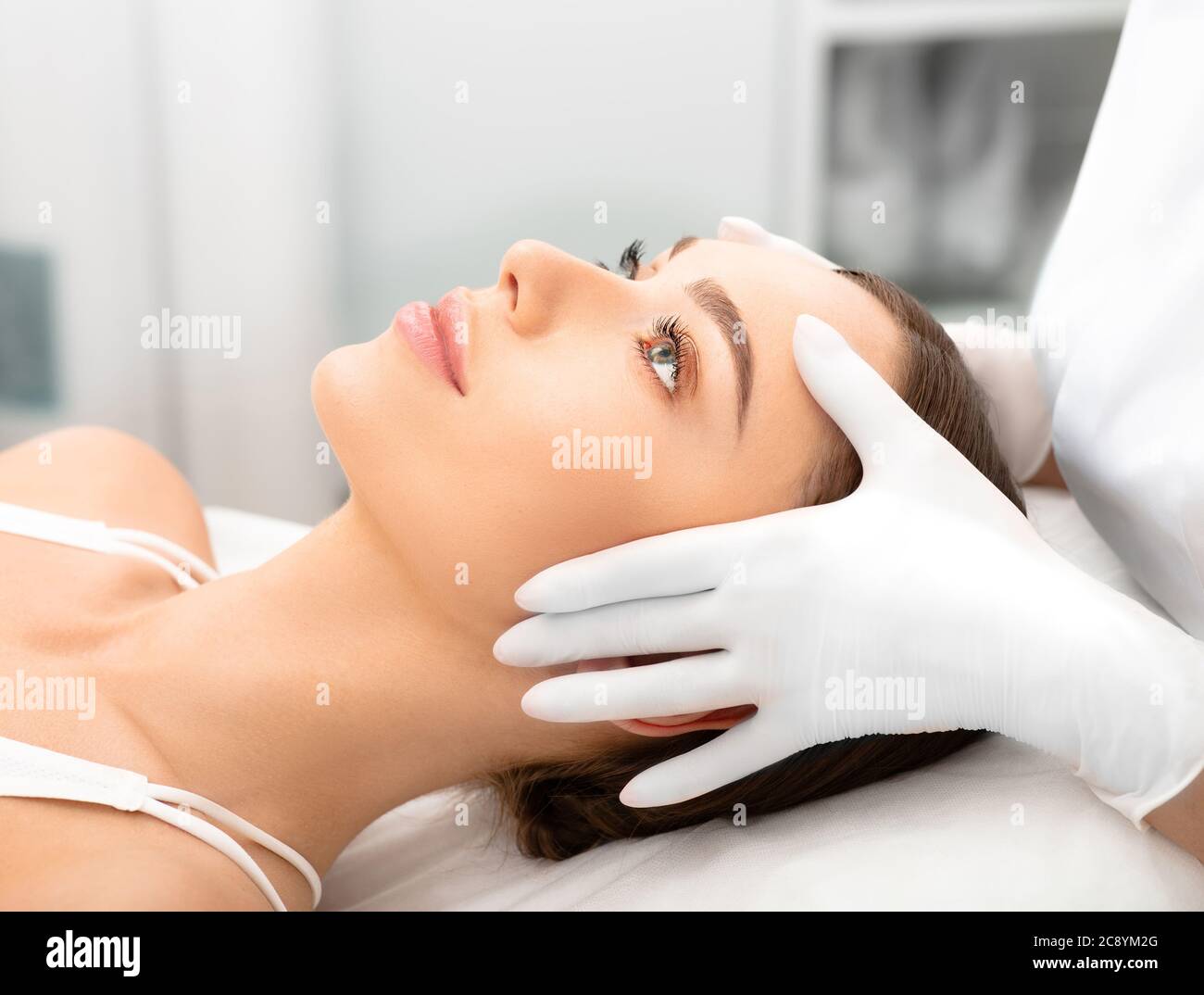 Beautiful woman, with smooth, shiny skin and a clean face, after ...