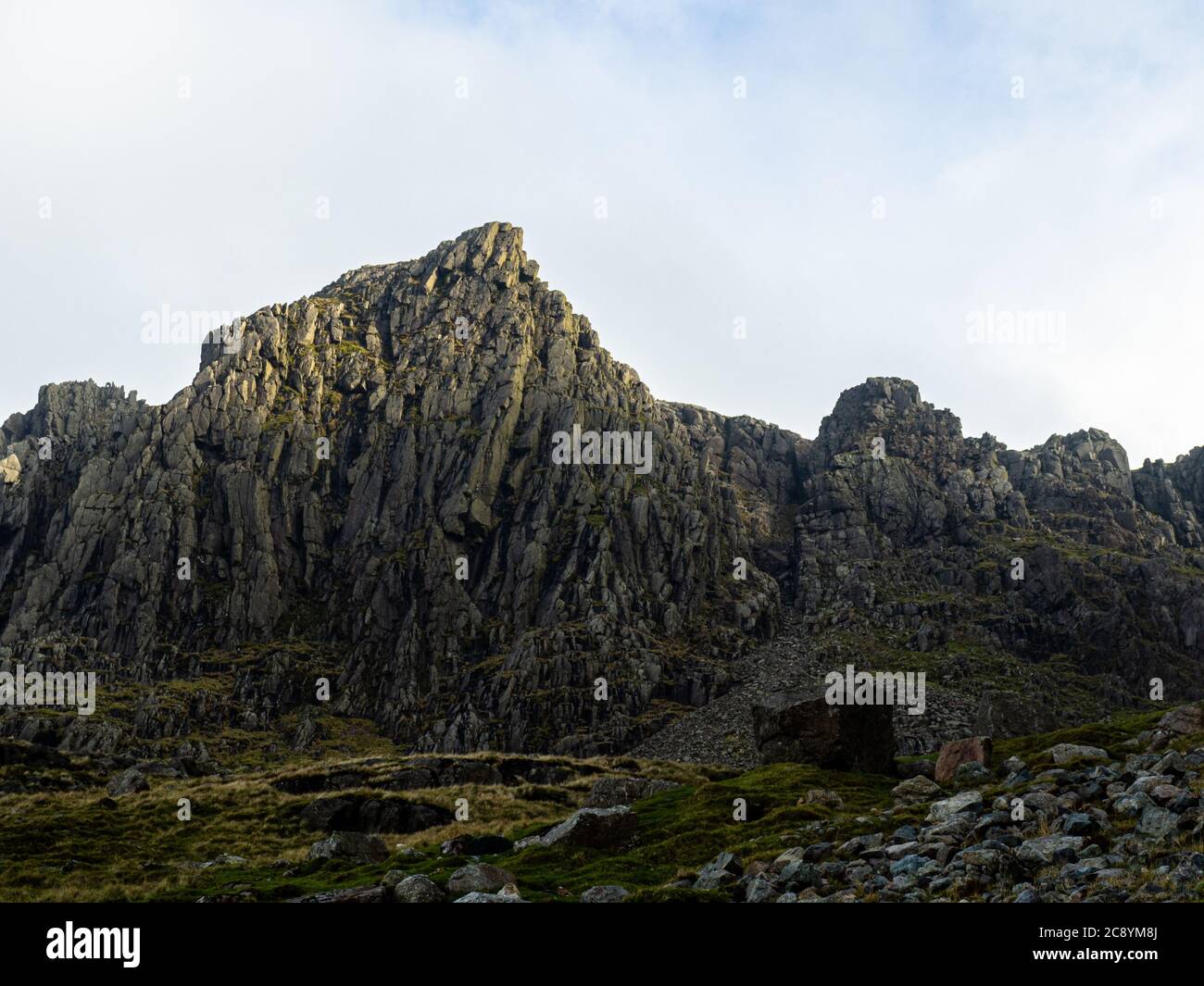 Light and shaddow on a rock face on the accent to Scafell Pike Stock ...