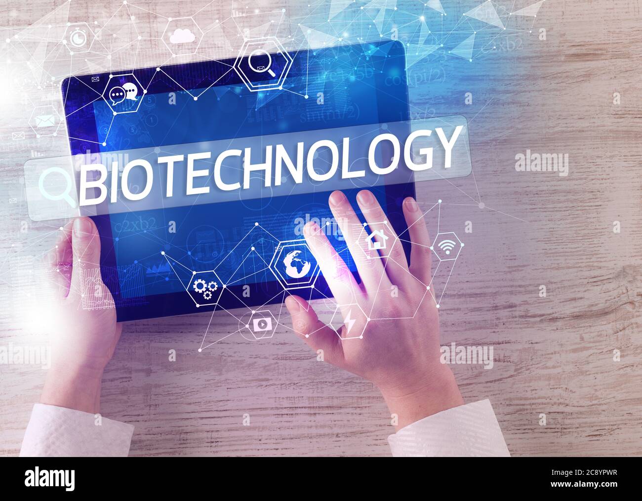 Close-up of a tablet searching BIOTECHNOLOGY inscription, hi-tech computing concept Stock Photo ...