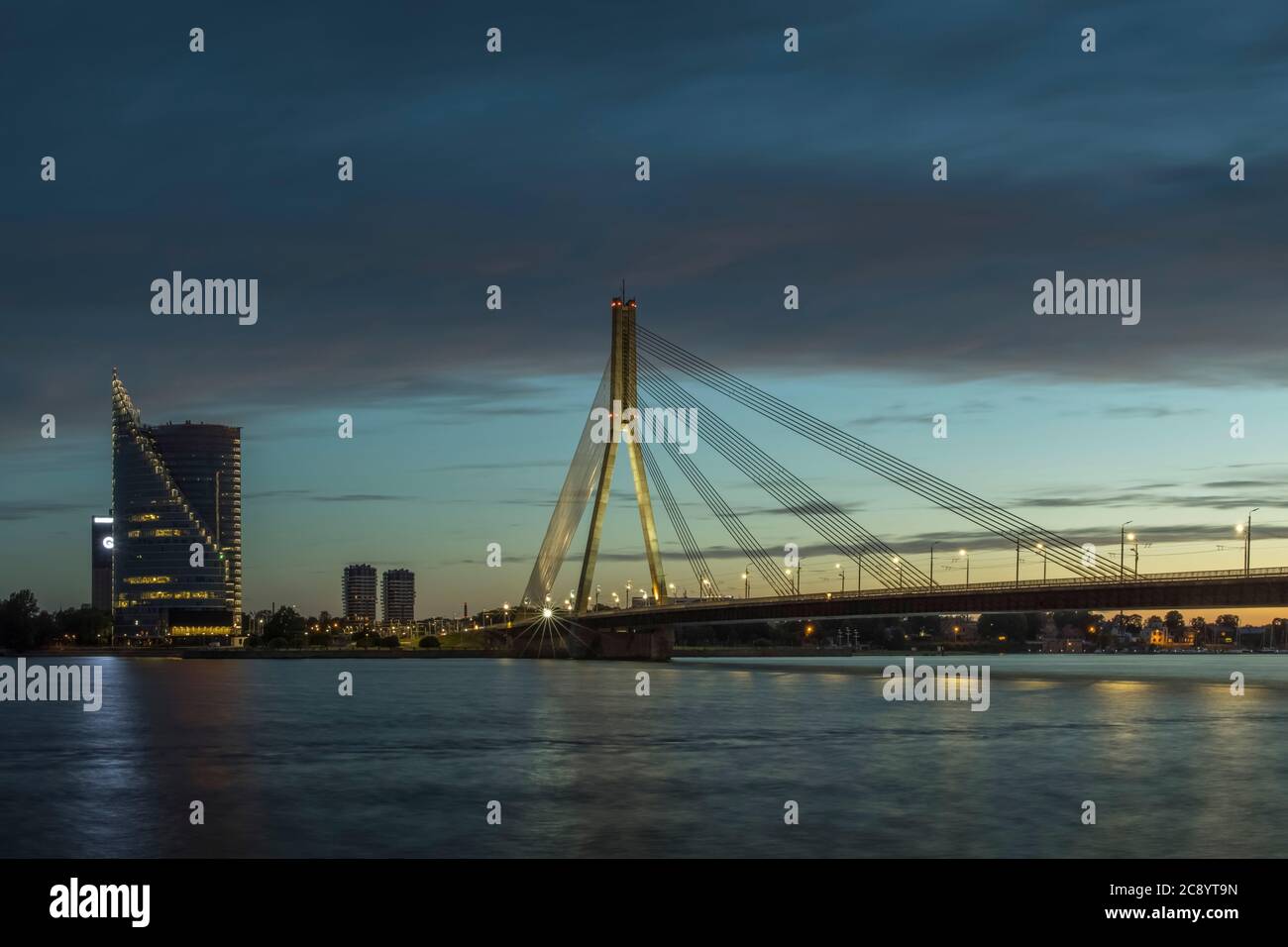 Cable stayed bridge across Daugava river at night in Riga, Latvia Stock ...