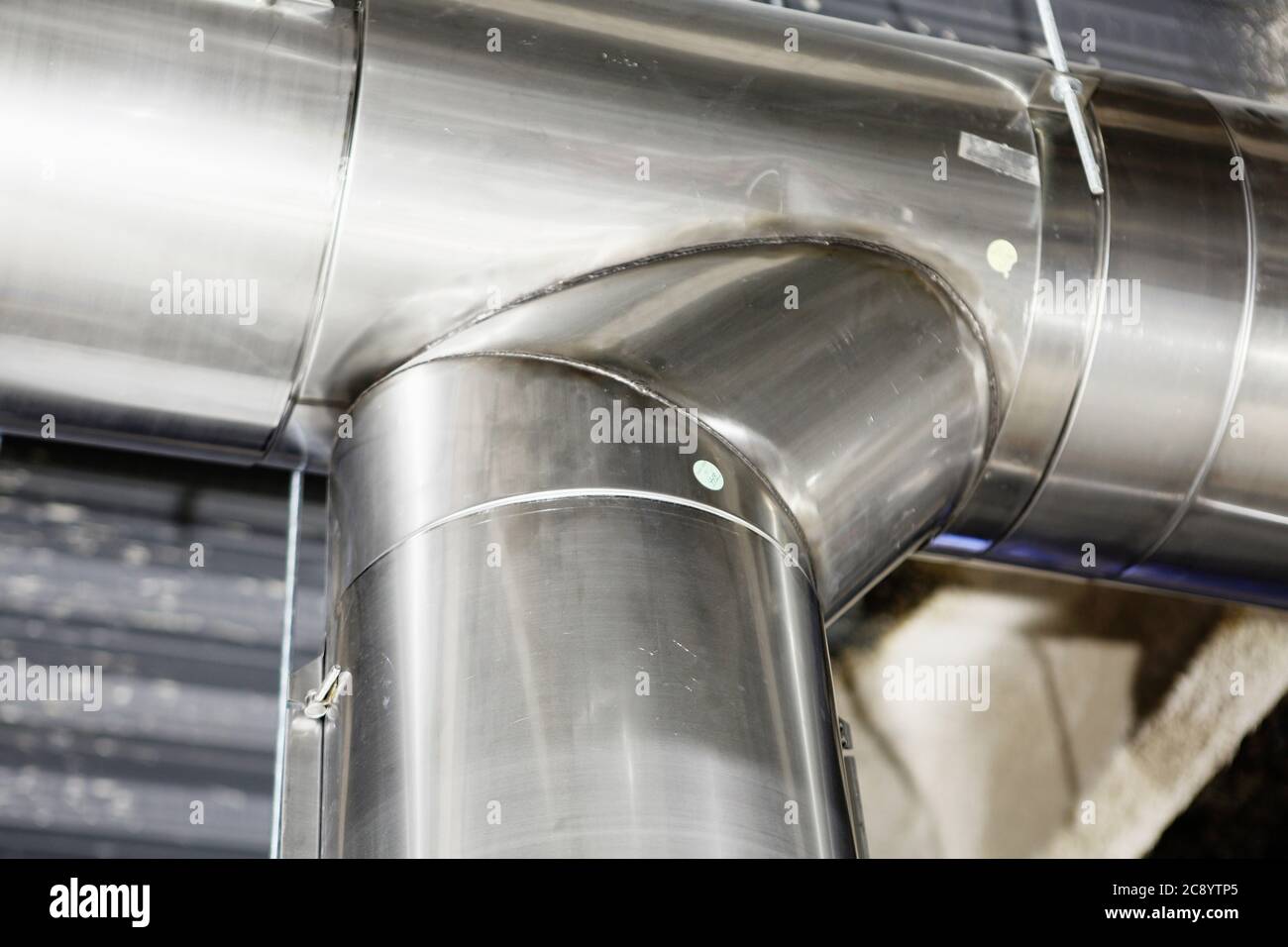 A closeup of stainless steel HVAC duct work in a modern hospital ...