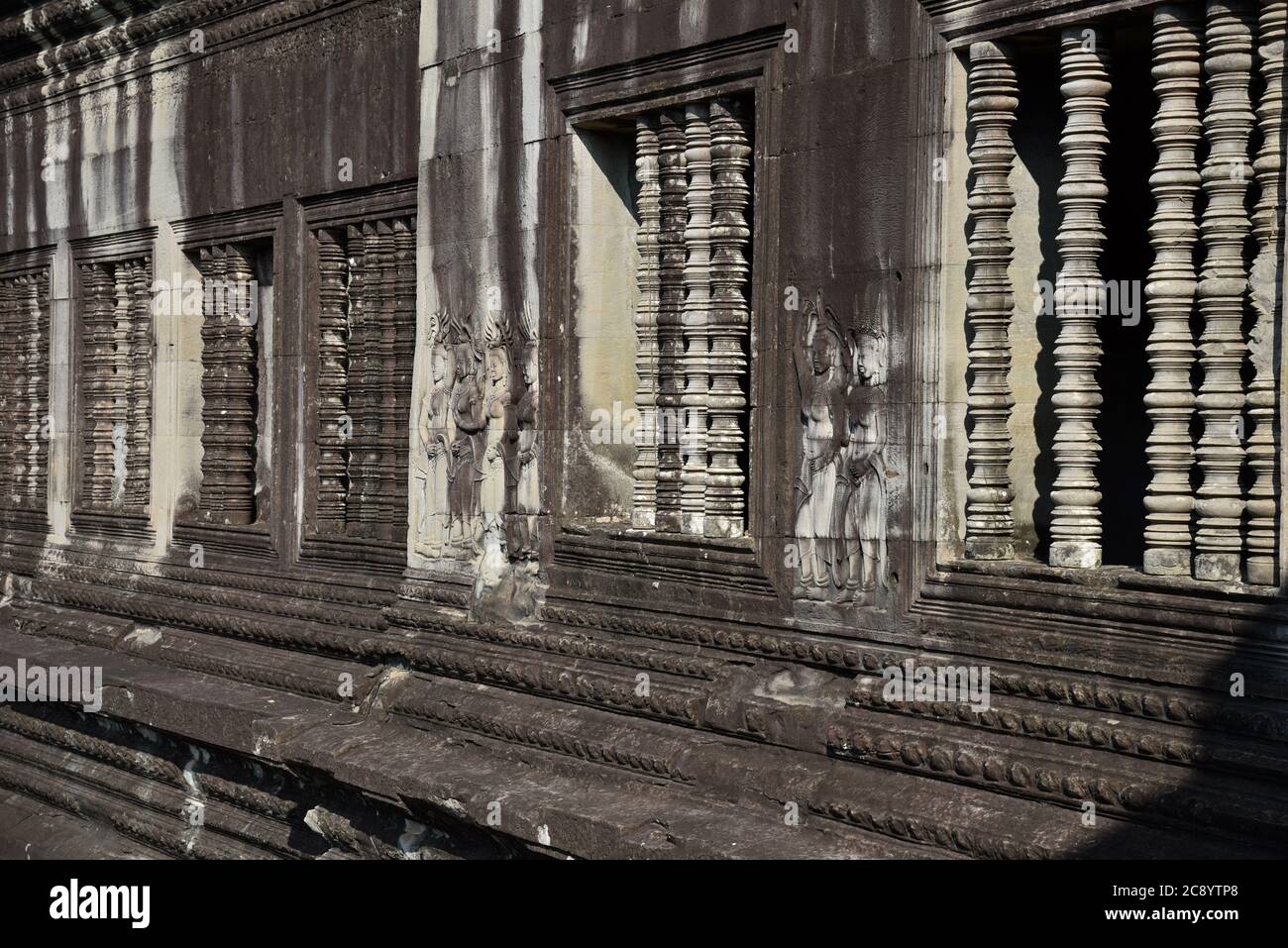 The typical window design in the ancient khmer culture with balusters ...