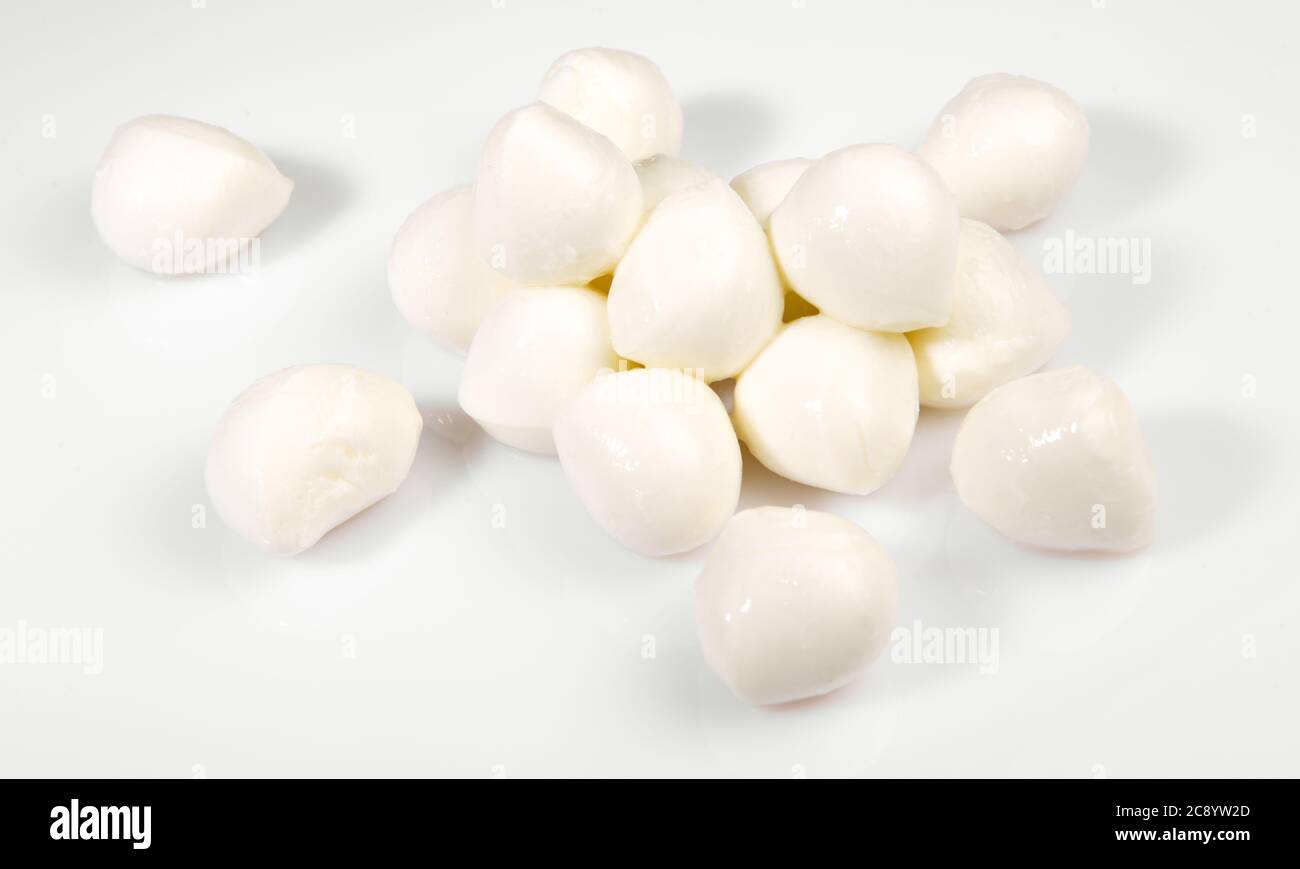 Baby Mozzarella isolated on white Background Stock Photo - Alamy