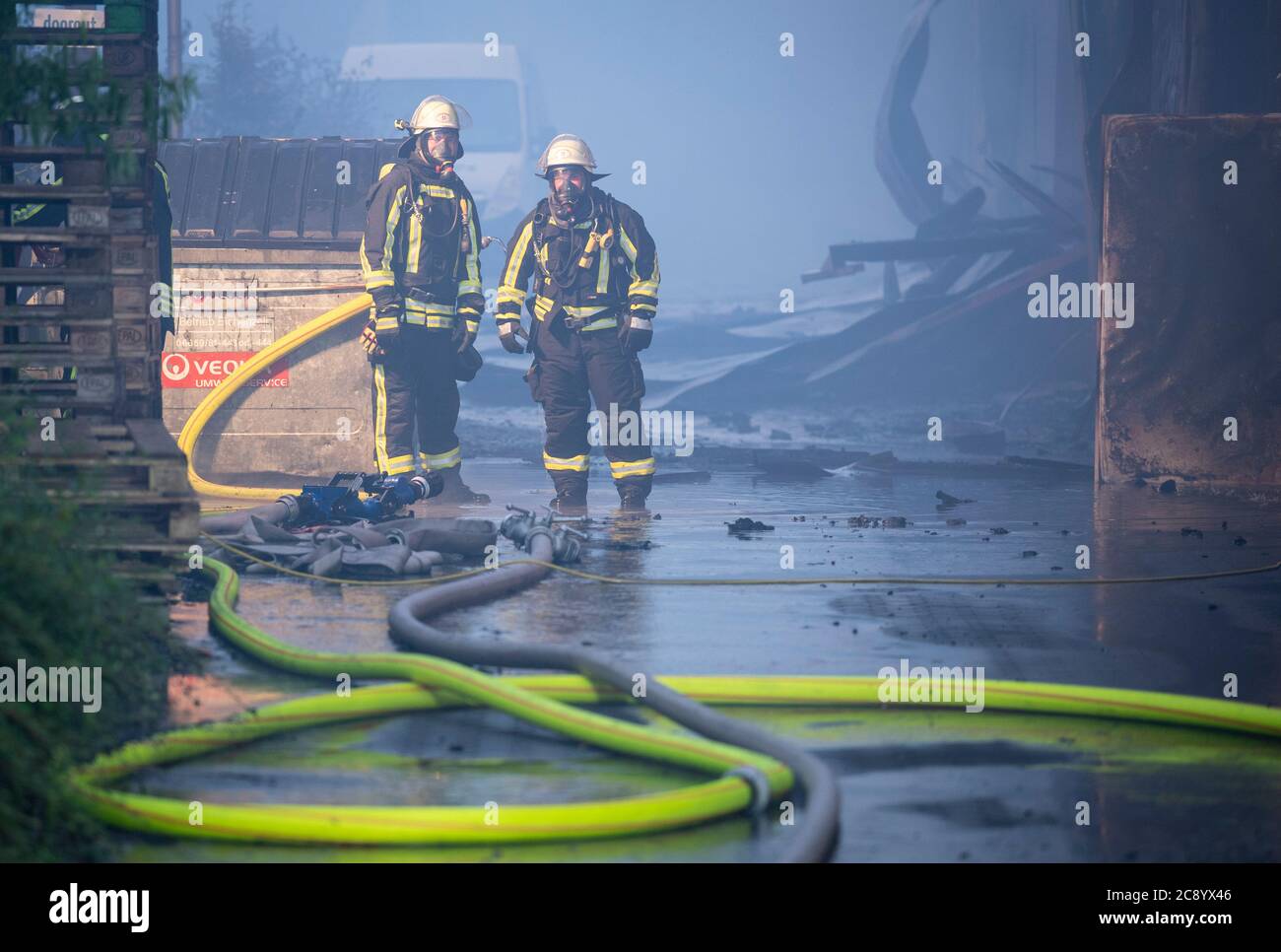 Firefighters warehouse fire fighting hi-res stock photography and ...