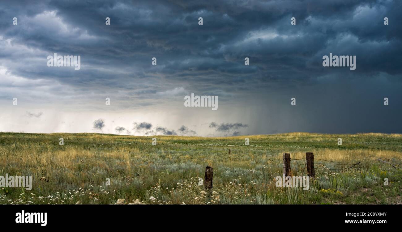 A photo of storm clouds over the plains of Colorado Stock Photo - Alamy