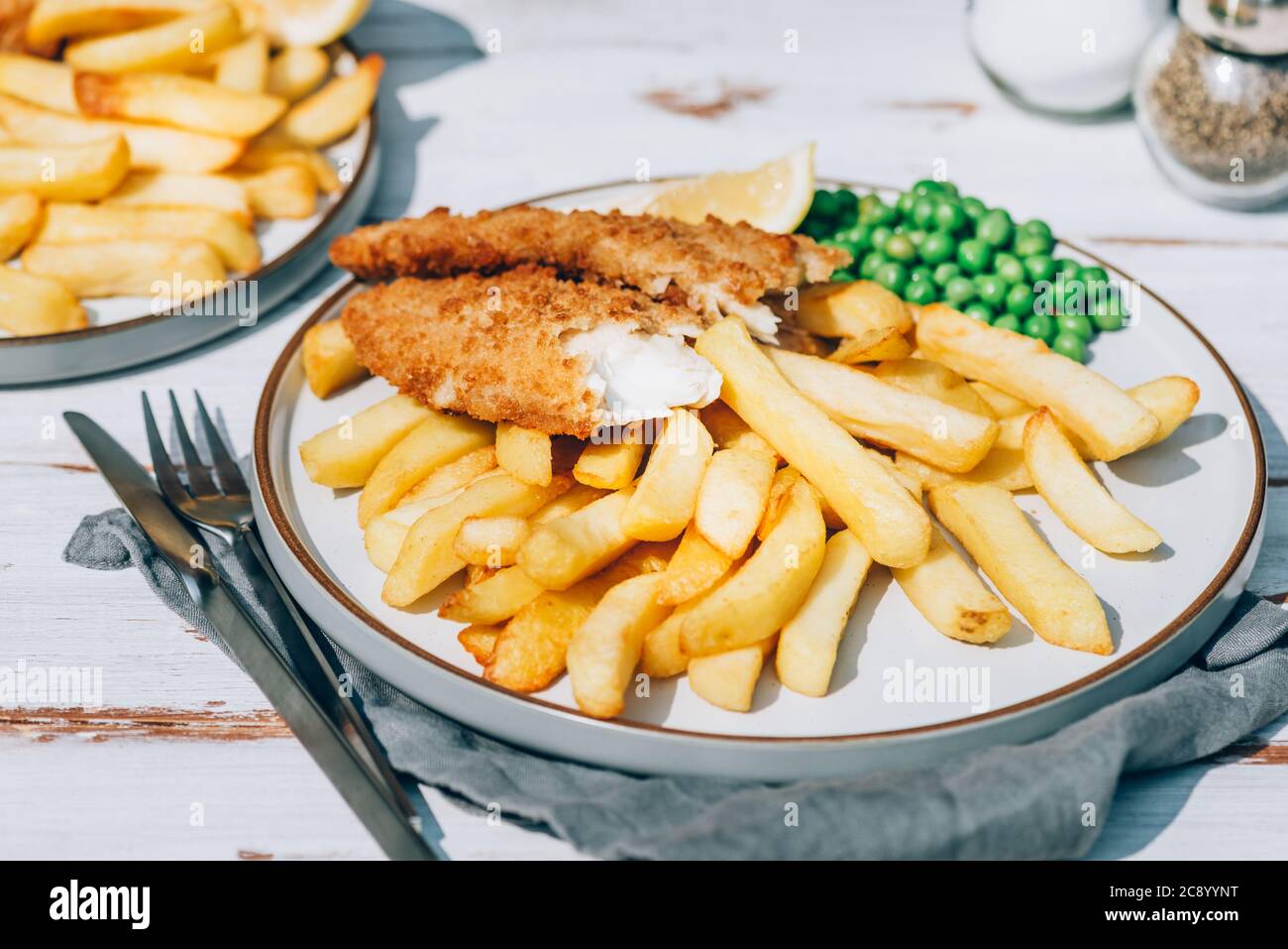Fish and Chips with peas Stock Photo - Alamy