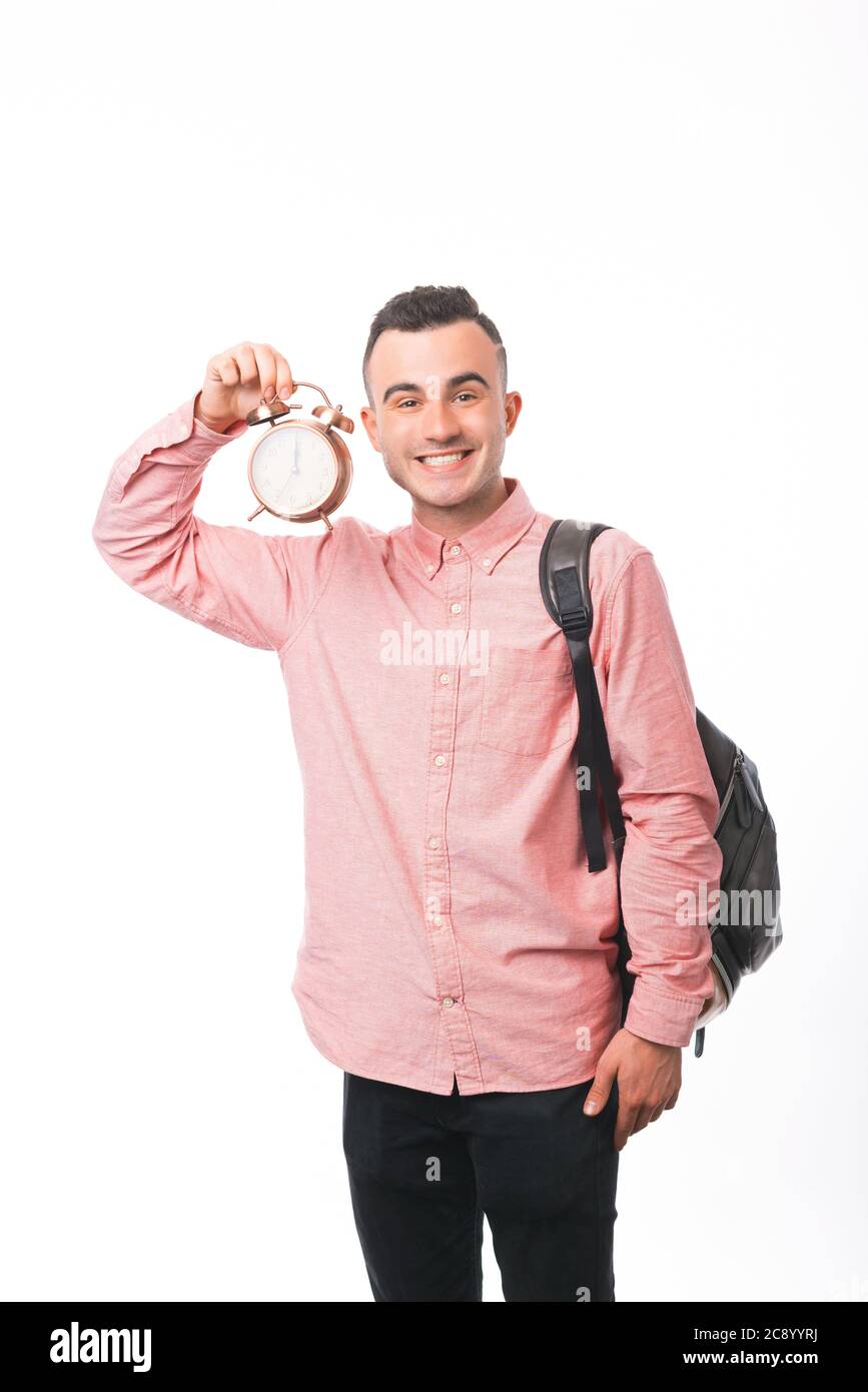 Management concept, young guy, smiling at camera and holsing a vintage ...