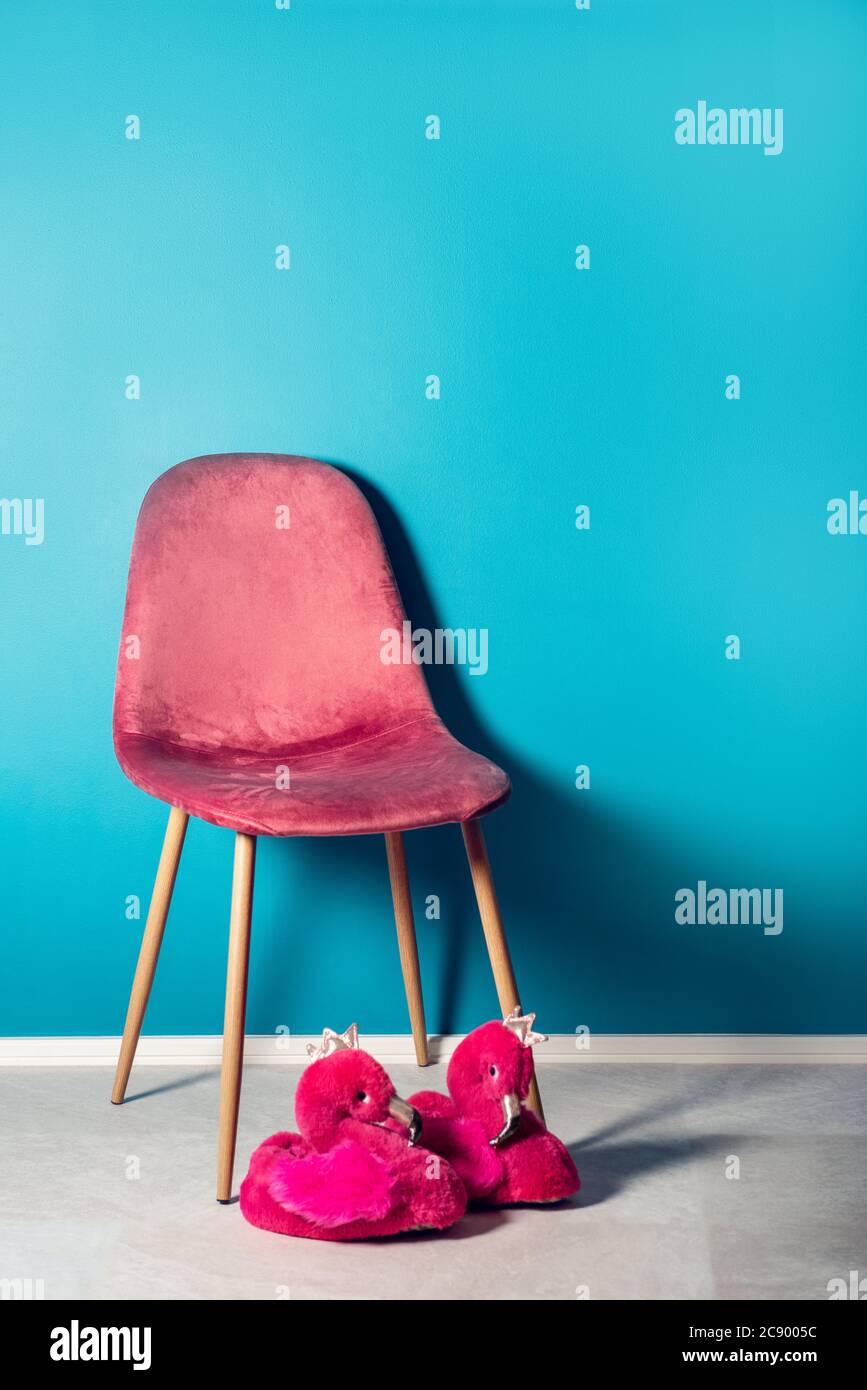 Modern Pink Velour Chair on wooden legs Stock Photo - Alamy