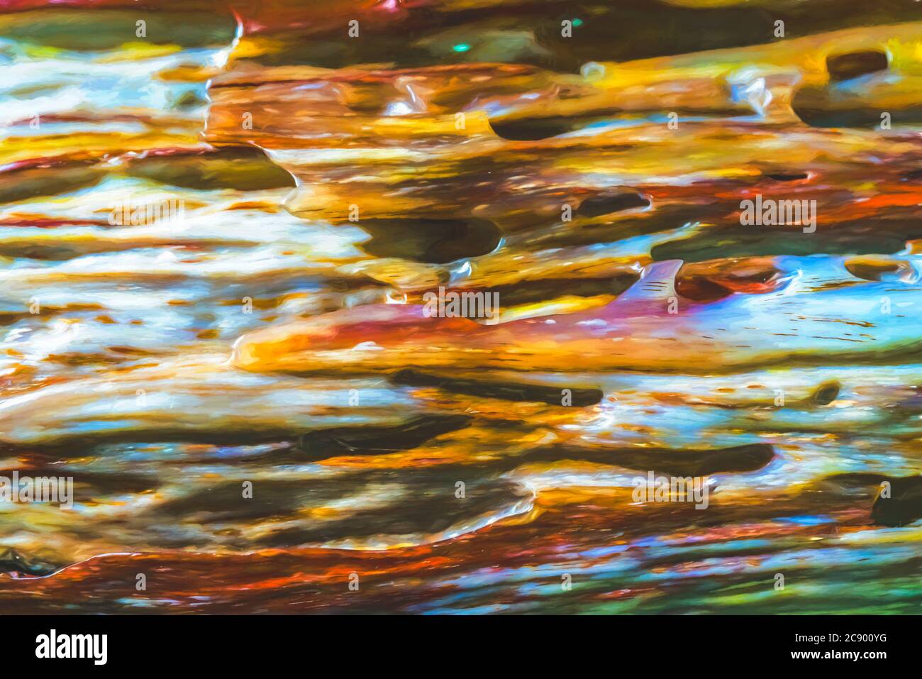 Close up of a colorful lines pattern on a natural crystal on display in ...