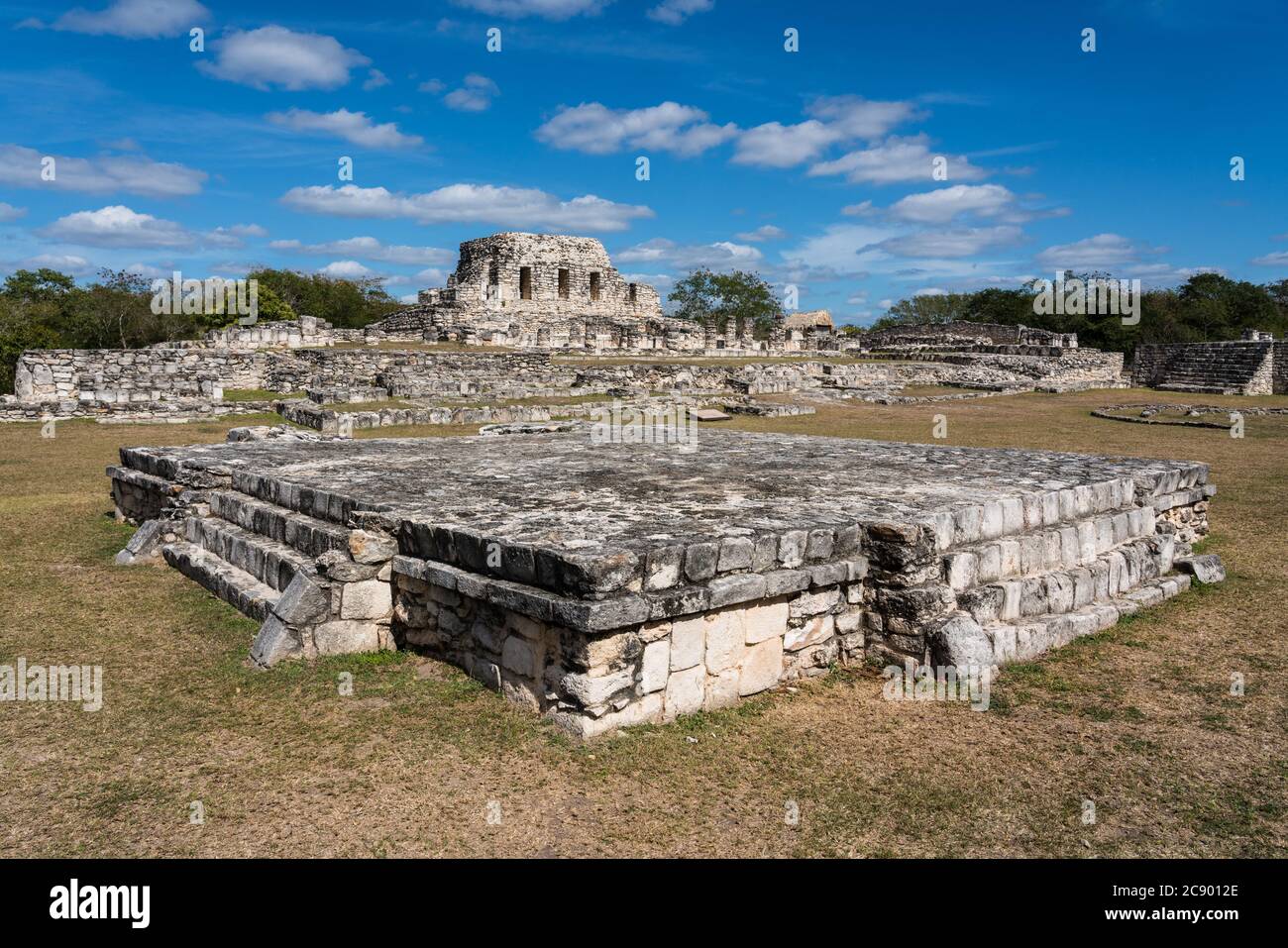 A ceremonial platform and the Temple of the Painted Niches in the ruins ...