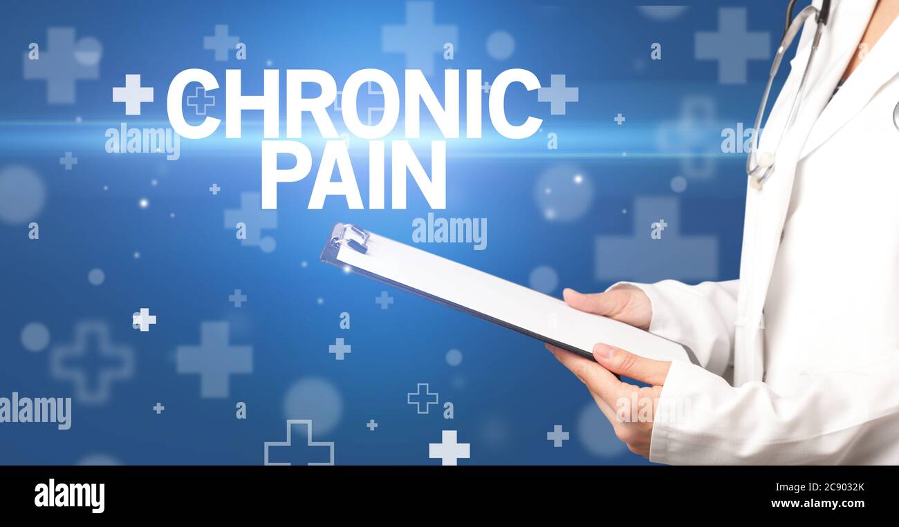 doctor writes notes on the clipboard with CHRONIC PAIN inscription ...