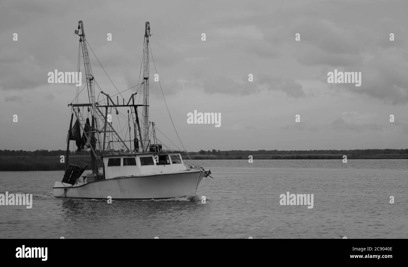 Commercial Fishing Boat Heading Out to Fish Stock Photo - Alamy
