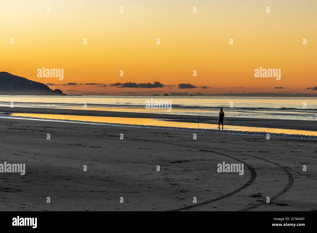 Ohope Beach, Bay of Plenty, New Zealand at sunset Stock Photo - Alamy