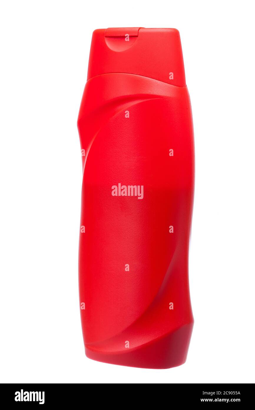 Bottle of red color on a white background, shampoo for washing of the ...