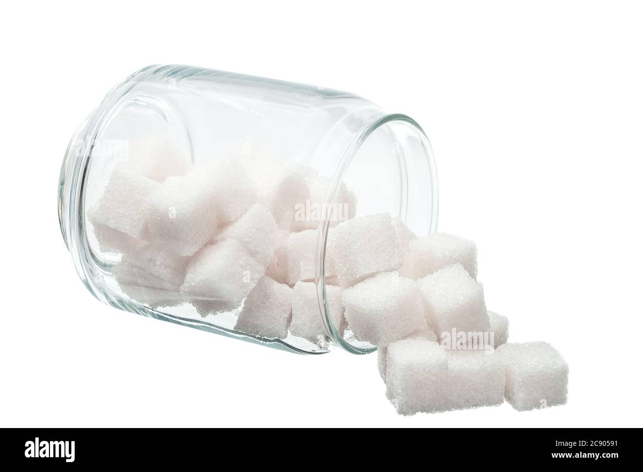 White lump sugar in a glass jar on a white background, sweet sugar in ...