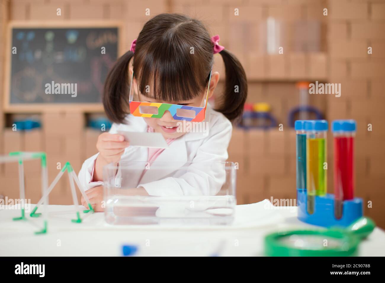 young girl play science experiments for homeschooling Stock Photo - Alamy