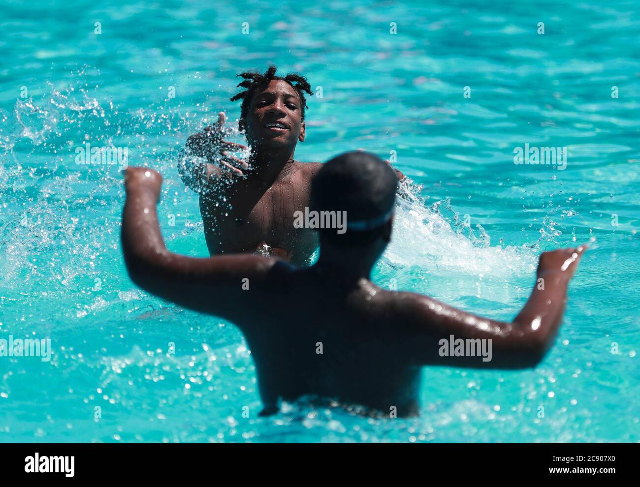 People enjoy wave in pool hi-res stock photography and images - Alamy