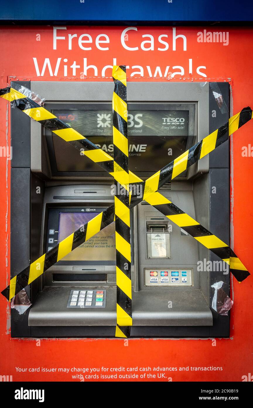 Closed off ATM machine, closed because of Covid 19 Stock Photo - Alamy