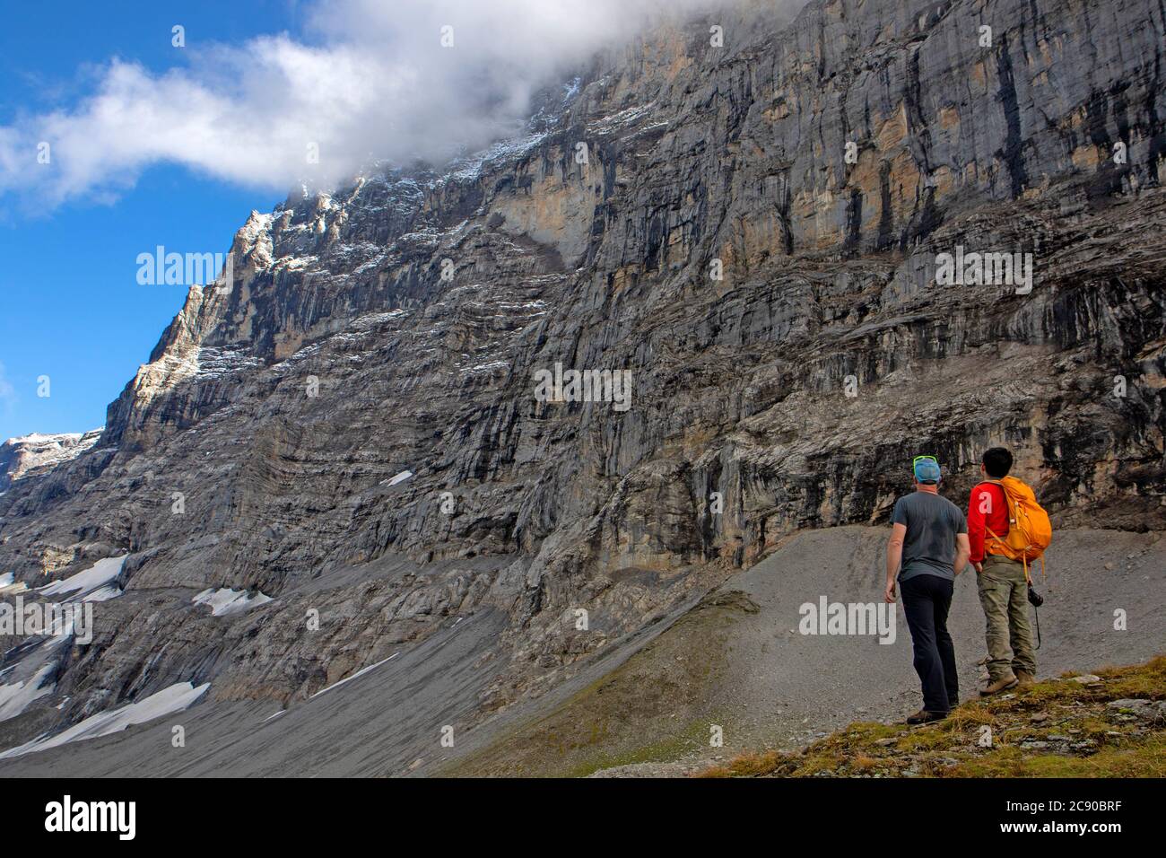 Hikers on the Eiger Trail above Grindelwald Stock Photo - Alamy