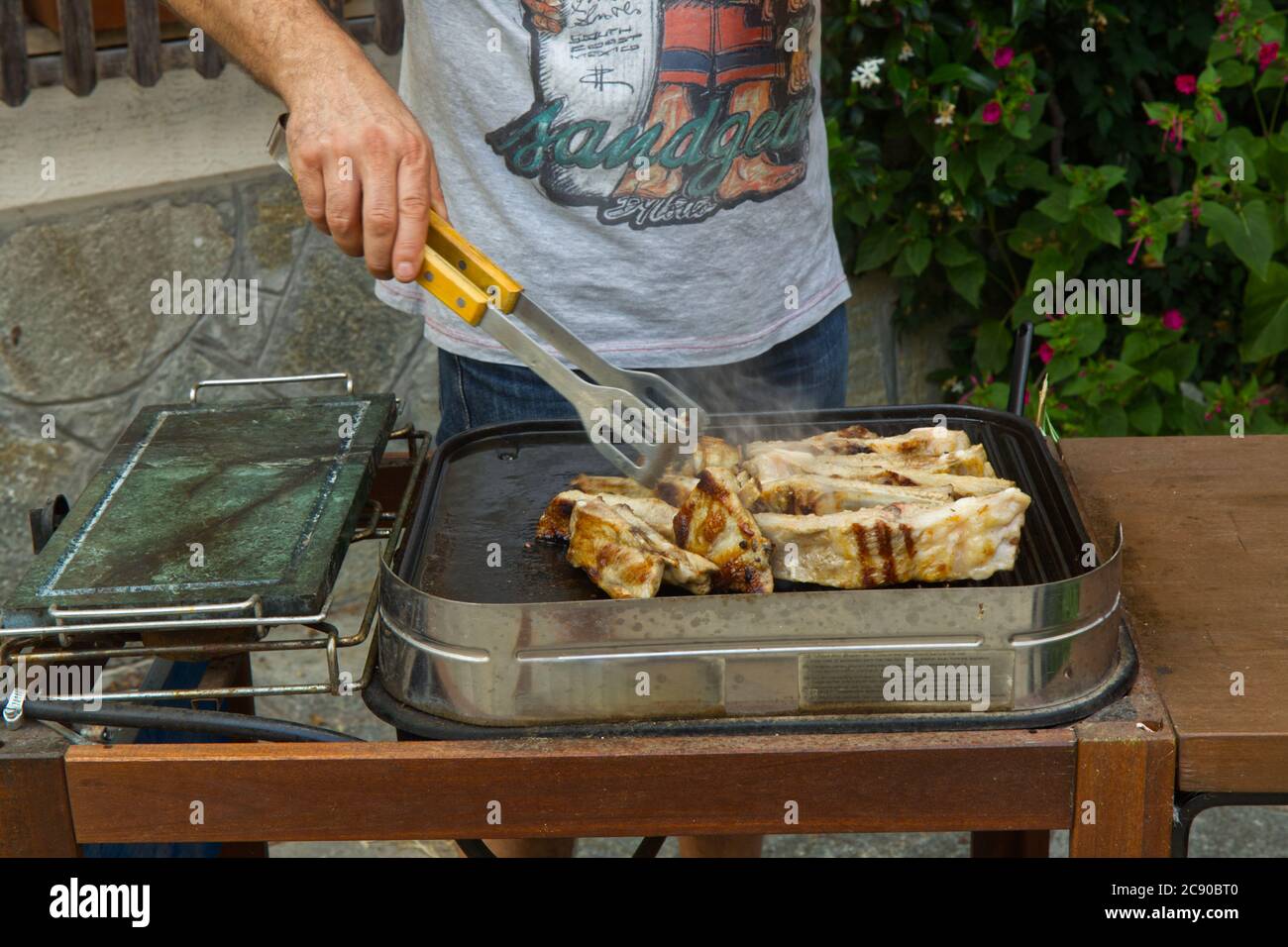 Fat man garden hi-res stock photography and images - Alamy