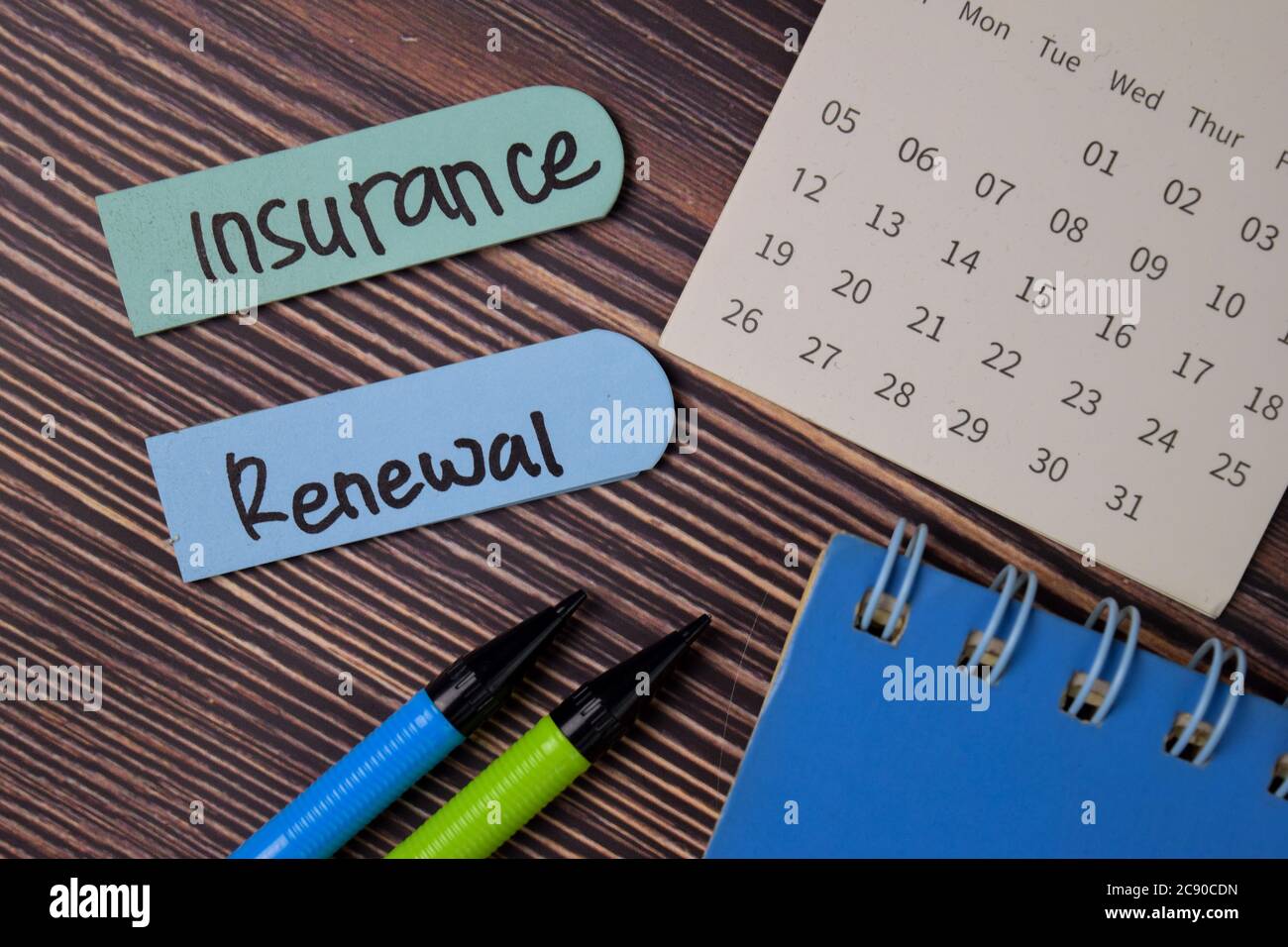 Insurance Renewal write on sticky note isolated on Office Desk Stock ...